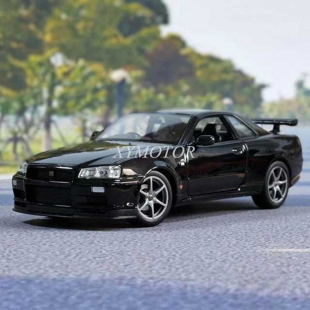 DIECAST CAR W/DISPLAY Case Nissan Skyline Gt-R (R34) White Welly ...