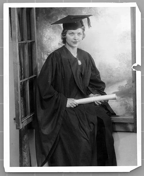 RECENT GRADUATE SMILES As She Poses, Clutching Her Hard-Earned Diplo ...