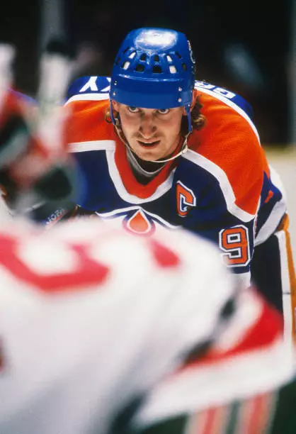 THE EDMONTON OILERS' captain Wayne Gretzky lines up for a face Hockey ...