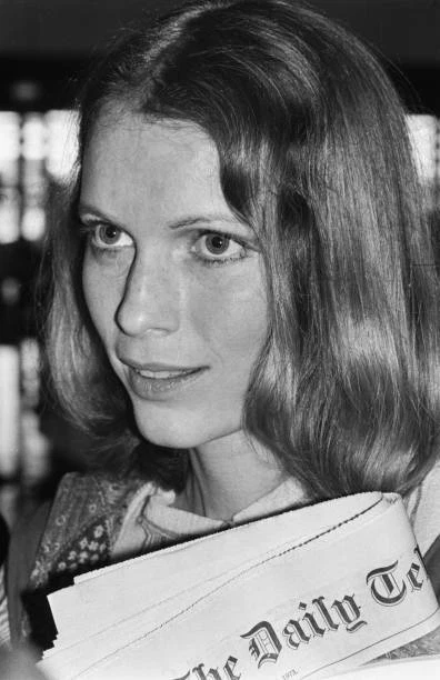 MIA FARROW HOLDING a copy of the Daily Telegraph at Heathrow OLD PHOTO ...