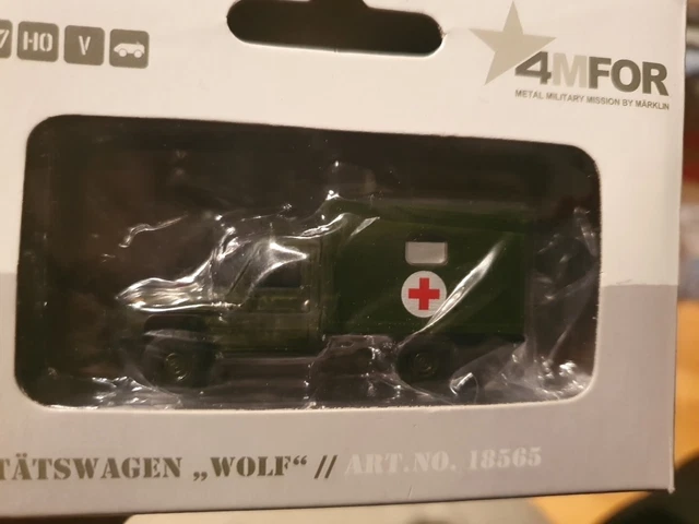 MÄRKLIN 4MFOR 18565 MB Sanitätswagen Wolf, BW, Oliv, 1:87 EUR 18,00 ...