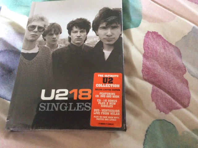 U2 18 SINGLES CD Includes DVD Live From Milan Vertigo 05 And 49 Page Book Sealed EUR 29,89 ...