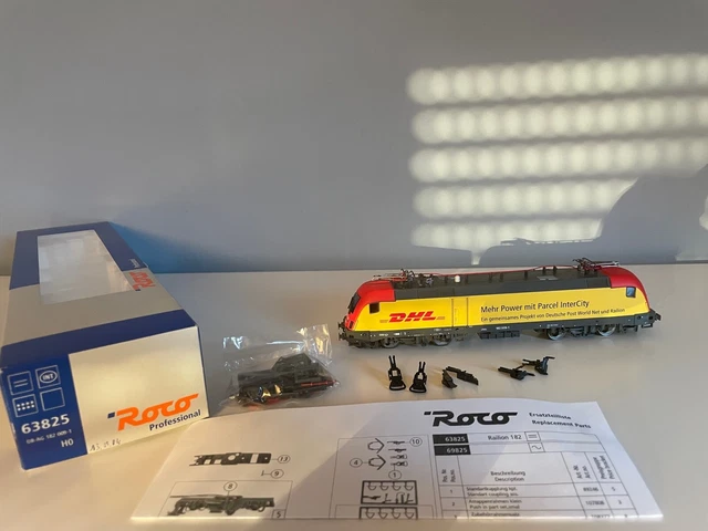 ROCO 63825, LOCOMOTIVE électrique BR 182 de la DB "DHL Design", dans sa ...