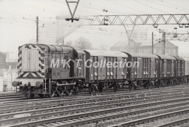 RAIL PHOTO CLASS 08 08262 shunter @ Stratford 17/3/79 with parcel vans ...