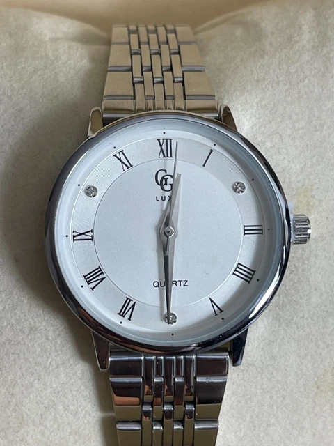 MONTRE FEMME PLATE cadran rond fond blanc et strass luxe en acier ...