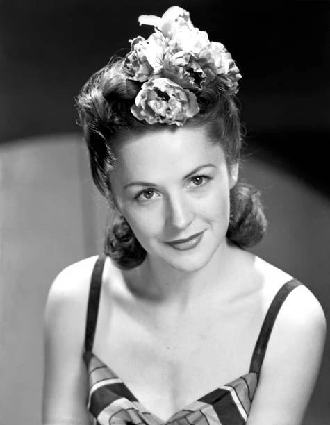 RADIO ACTRESS HELEN Lewis models hair styles for a portrait in N 1940s ...