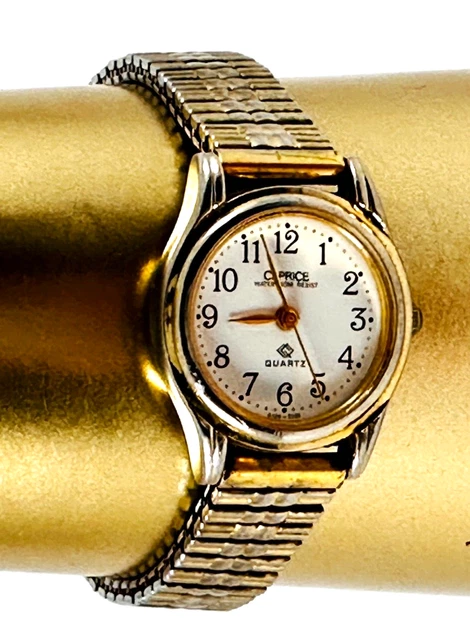 WORKING CAPRICE WHITE Face Light Gold Tone Stretch Band Wristwatch WR ...