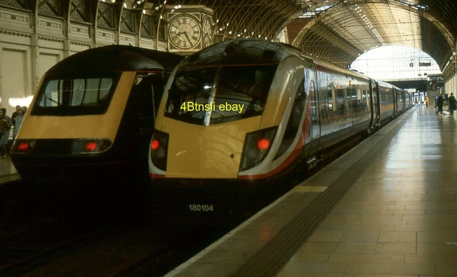 ORIGINAL 35MM SLIDE Class 180/1 Adelante 180104 alongside a HST at ...