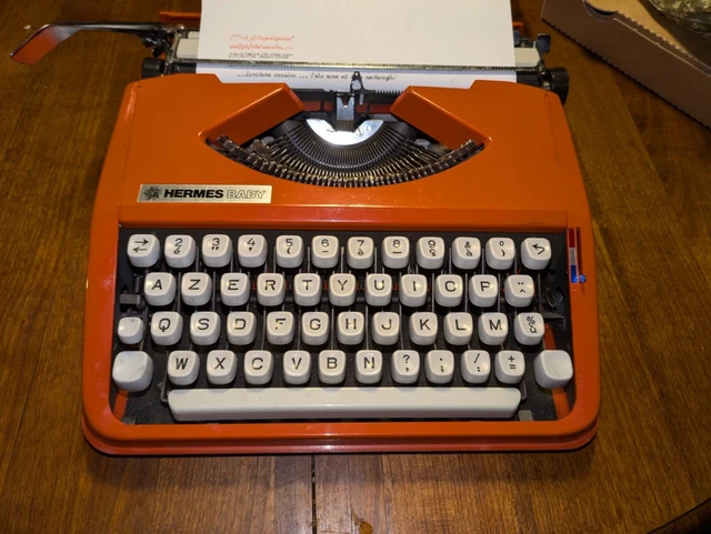 MACHINE À ÉCRIRE Hermes Baby cursive rouge Révisée, avec notice+ Ruban ...