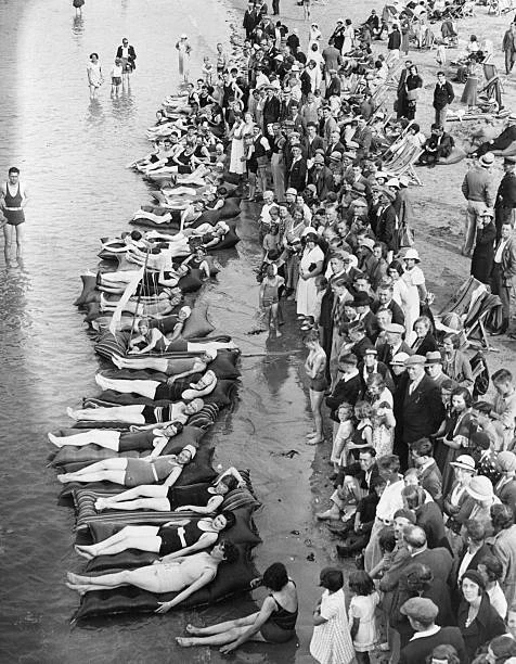 SUNBATHERS ON THE beach at Margate using the latest novelty, - 1934 Old ...