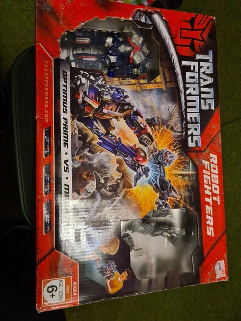 TRANSFORMERS ROBOT FIGHTERS game-optimus prime v megatron £9.99 ...