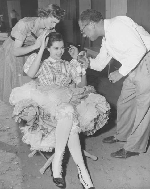 CYD CHARISSE IS checked over by hairdresser Peggy Shannon and m - Old ...