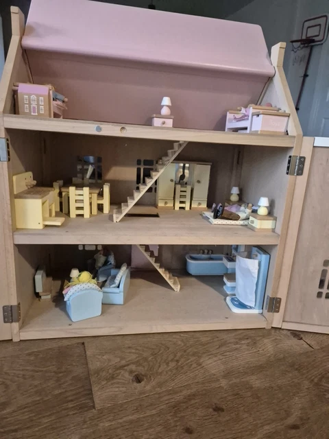 JOHN LEWIS WOODEN doll's house with furniture and dolls £42.30 ...