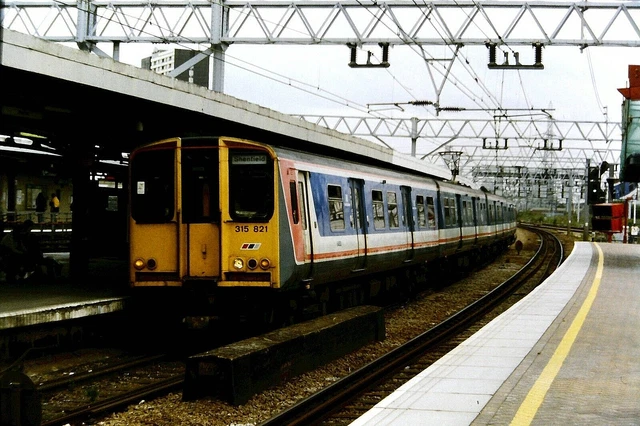 ORIGINAL 35MM SLIDE, NSE Liveried Class 315 EMU 315821..Stratford?? £1. ...