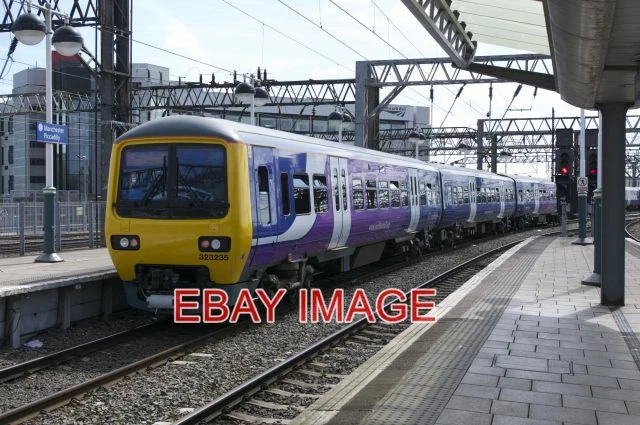 PHOTO CLASS 323 Set 323235 Departs Manchester Piccadilly £1.00 ... PHOTO CLASS 323 Set 323235 Departs Manchester Piccadilly £1.00 ...
