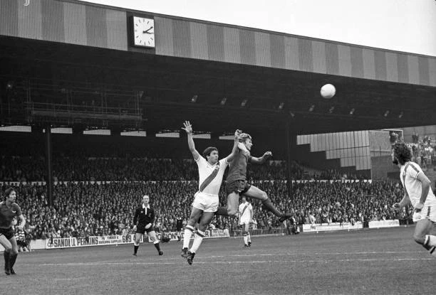 KEN SANSOM OF Crystal Palace involved in a high-flying tussle - 1977 ...