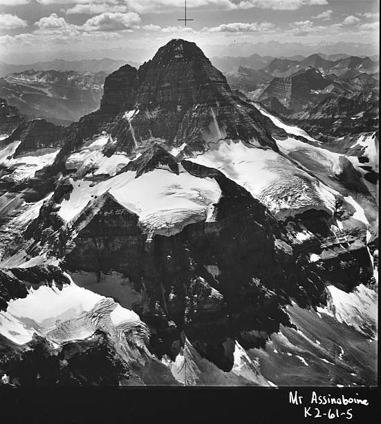 BRITISH COLUMBIA'S MOUNT Assiniboine triangular peak border between ...
