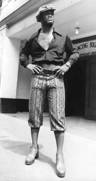 JOE FRAZIER , World Champion Heavyweight boxer models clothing- 1973 ...