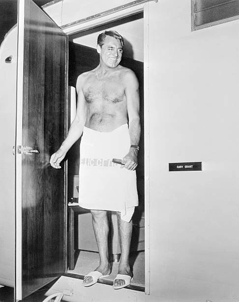CARY GRANT USUALLY a model sartorial elegance displays this bri- 1962 ...