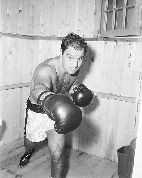 WORLD HEAVYWEIGHT CHAMPION Rocky Marciano Punches OLD BOXING PHOTO $8. ...