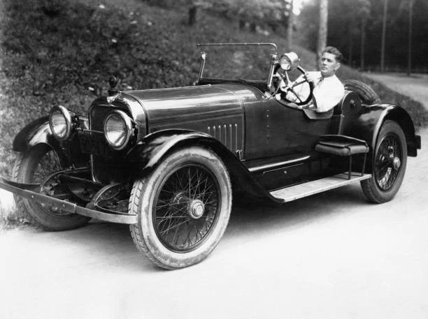 AMERICAN BOXING CHAMPION Gene Tunney drives his convertible car 1930 ...