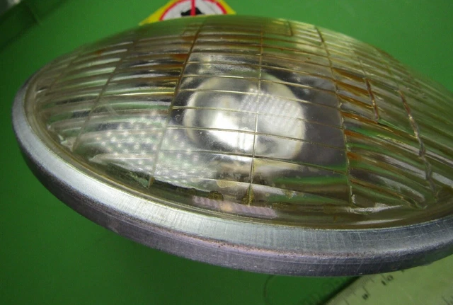 HONDA SPORT 250 Headlight 6v 35/25 watt🔥6 1/2" od🔥Has Yellow stuff ...