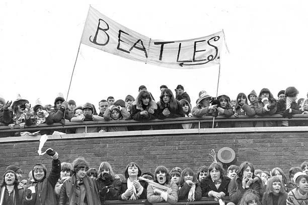 CROWD OF FANS of British pop group The Beatles at London Airport 1965 ...