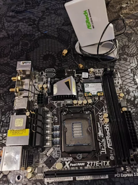 CARTE MĆRE ASROCK Z77E-ITX Intel LGA 1155 Mini-ITX motherboard EUR 15 ... CARTE MĆRE ASROCK Z77E-ITX Intel LGA 1155 Mini-ITX motherboard EUR 15 ...