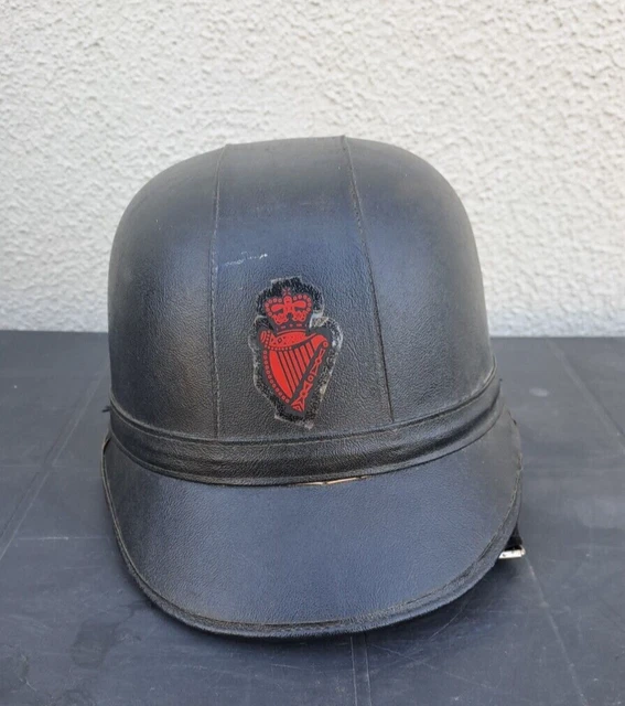 ROYAL ULSTER CONSTABULARY public order Skulgarde cork helmet, Irish £ ...