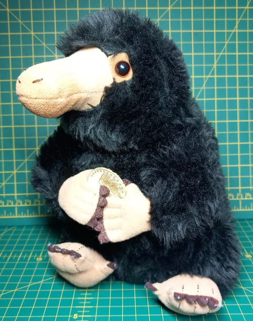 ANIMALI FANTASTICI SNIFFLER peluche con moneta Harry Potter mondo ...