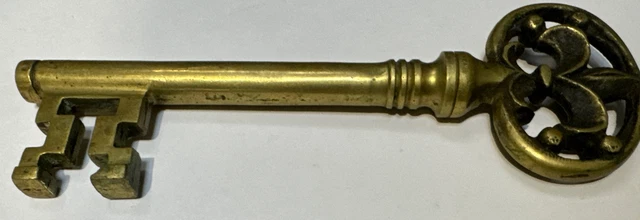 ANCIEN TIRE BOUCHON en bronze formant une clef de château " fleur de ...