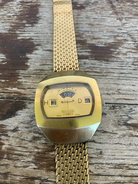 MONTRE À GUICHET, jump hour, heure sautante, Sicura. , mécanique EUR 70 ...