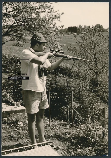 PHOTO CIRCA 1960 hunter with rifle and rifle scope sniper rifle in ...