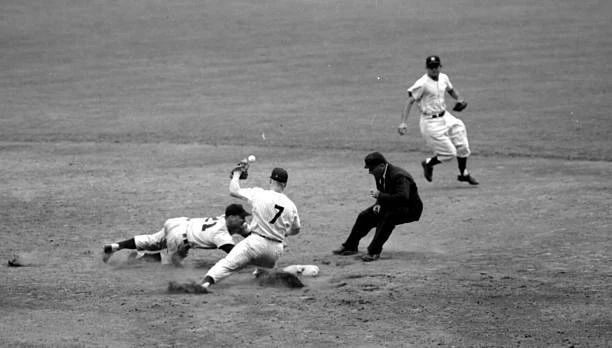 YANKEES MICKEY MANTLE playing second base for first time tries to ...