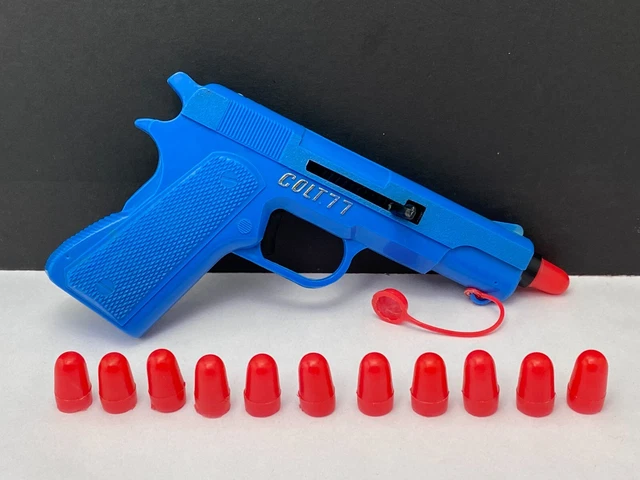 1970'S VINTAGE COLT 77 TOY POP GUN with polythene cap bullets. Stored ...