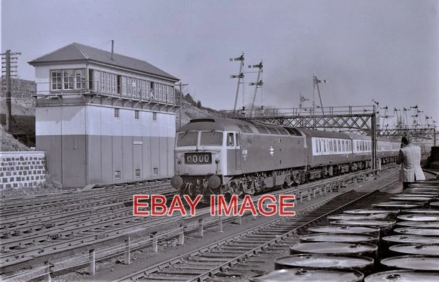 PHOTO CLASS 47 Number 47038 Heads A South-Bound Train Passing The ...