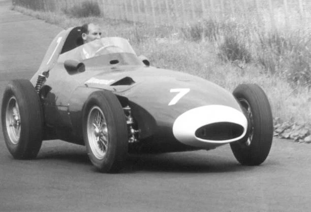 ENGLISH RACING DRIVER Stirling Moss his Vanwall during practic- 1958 ...