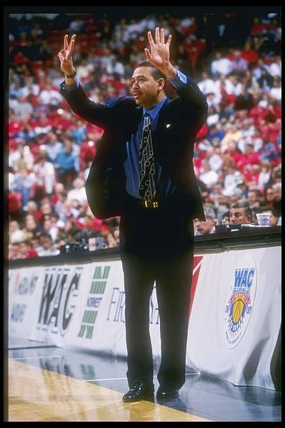 COACH WILLIS WILSON Rice Owls creates hand signals at a playoff ga- Old ...