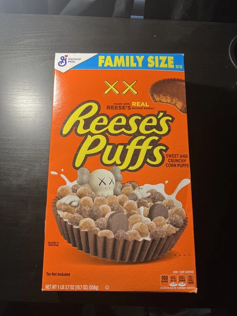 KAWS REESES PUFFS Family Size Cereal Box Limited Edition. Sealed, Sold ...
