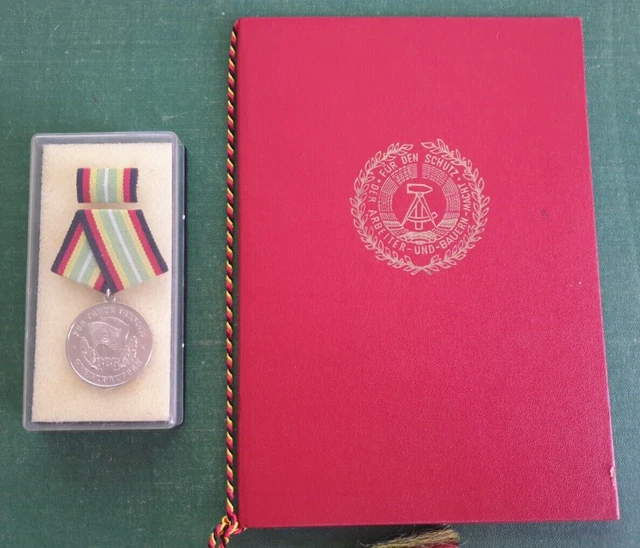 DDR MEDAILLE + Urkunde - Verdienstmedaille der Grenztruppen in Silber ...