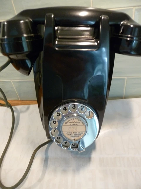 VINTAGE BLACK BAKELITE wall telephone with numeric chrome rotary dial ...