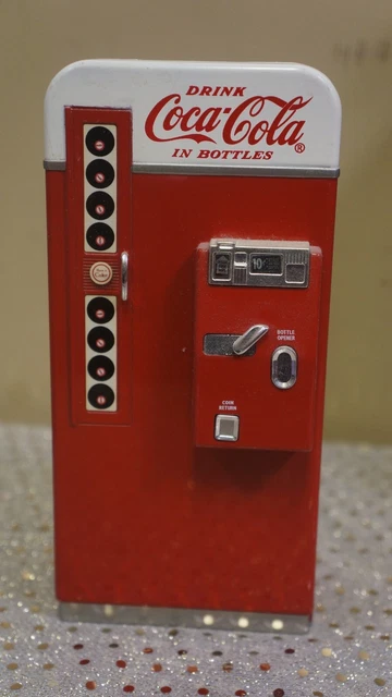 COCA COLA VENDING machine bank..1995..sturdy die cast...NIB ...