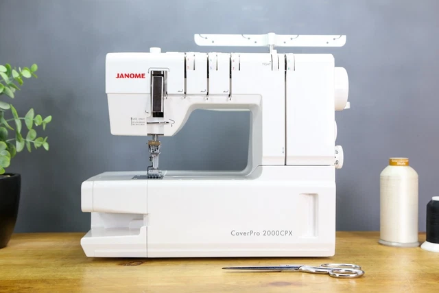 EX-DISPLAY BOXED JANOME Coverpro 2000CPX Sewing Machine + Warranty £525 ...