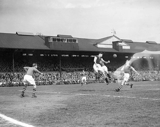 FOOTBALL BURNLEY'S GEORGE Bray heads away from Chelsea's Hugh Bill- Old ...