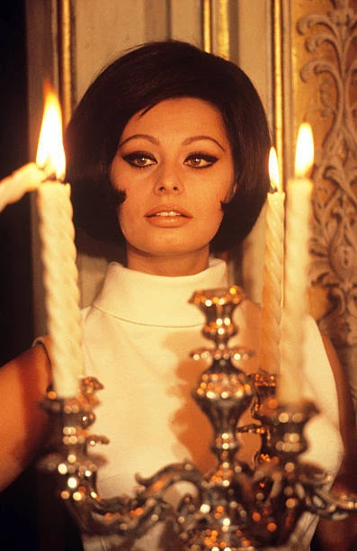 SOPHIA LOREN IN a posed portrait behind a chandelier Sixties Old Photo ...