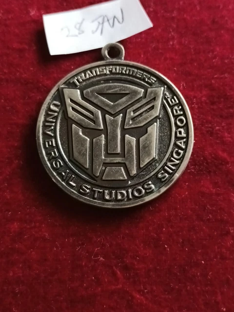 TRANSFORMERS MEDAL UNIVERSAL Studios Singapore EUR 3,50 - PicClick IT