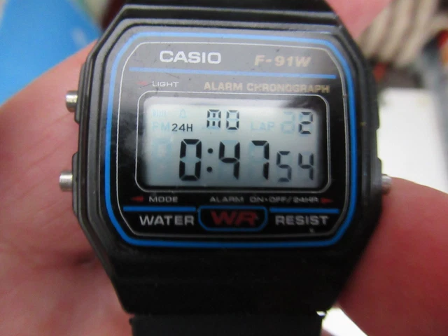 CASIO LCD F-91W Alarm Chronograph Plastic Case And Strap Watch 593 £7. ...