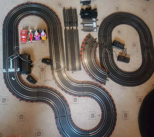 CARRERA RACING TRACK ,granny and lightening McQueen 4 cars bundle £38. ...