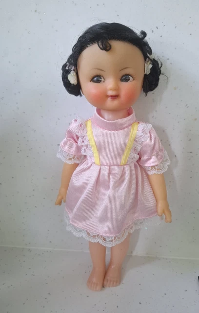 1960S PLASTIC DOLL WITH PAINTED FACE BLACK HAIR & PINK DRESS £20.00 ...
