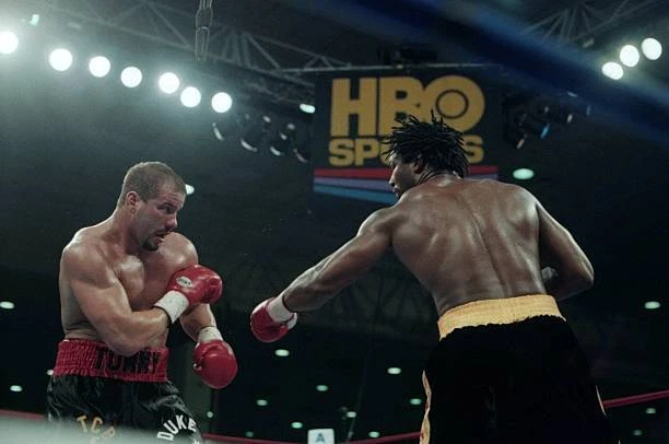 LENNOX LEWIS THROWS A Punch V Tommy Morrison 1 Old Boxing Photo $9.00 ...